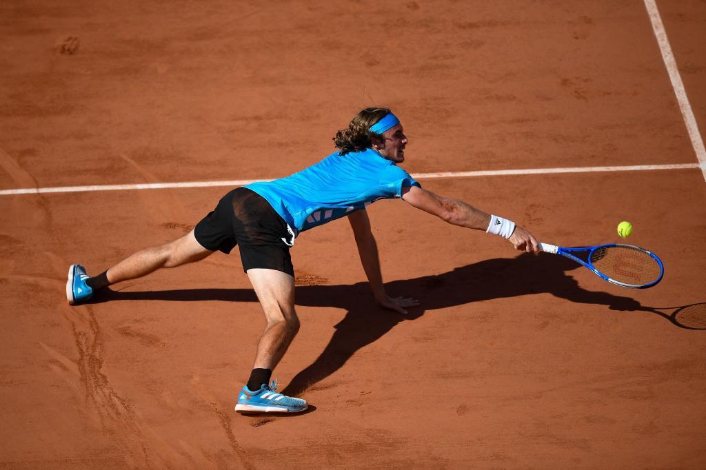 A five-hour match, Tsitsipas' rage and other curious images from Day 8 ...